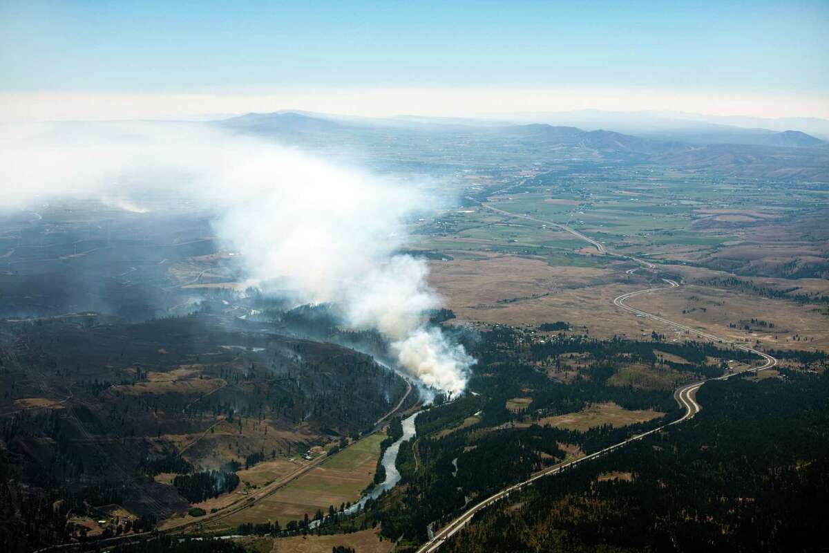 Wildfires burn the West