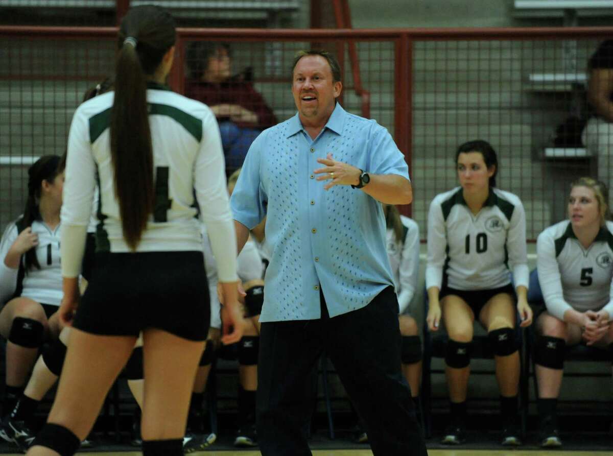 Reagan flexes muscle in volleyball win