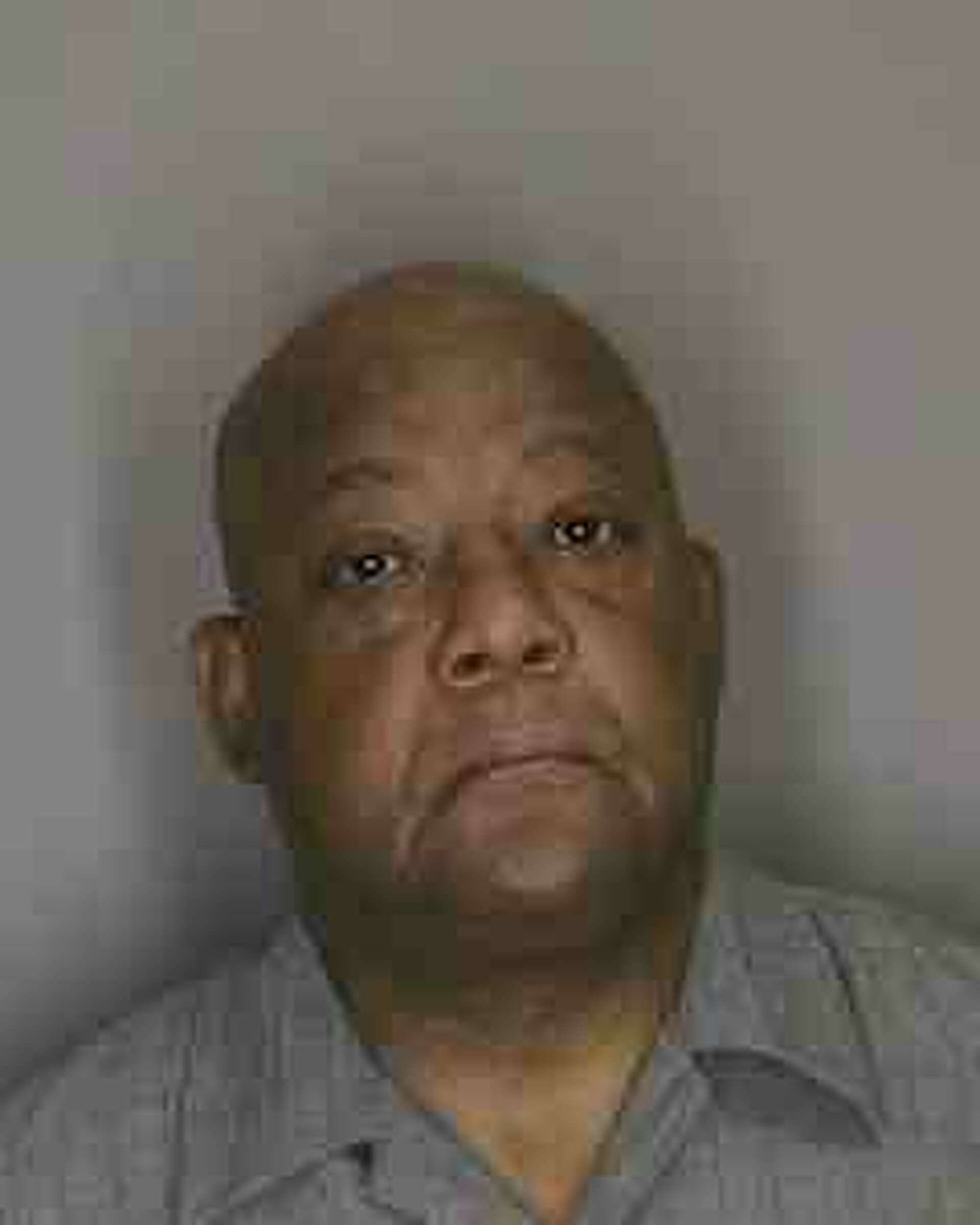 Ex-lawmaker's husband admits theft from county