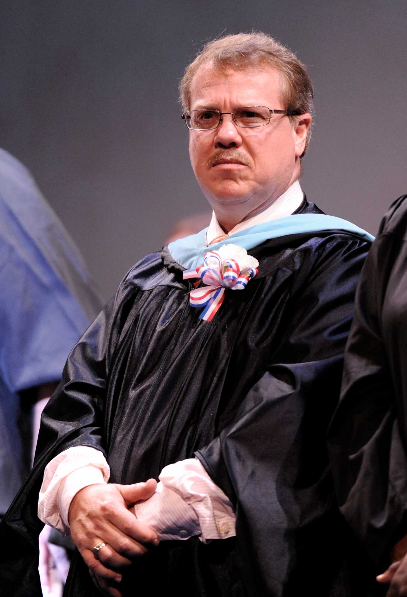 Ex-schools chief Ely resigns
