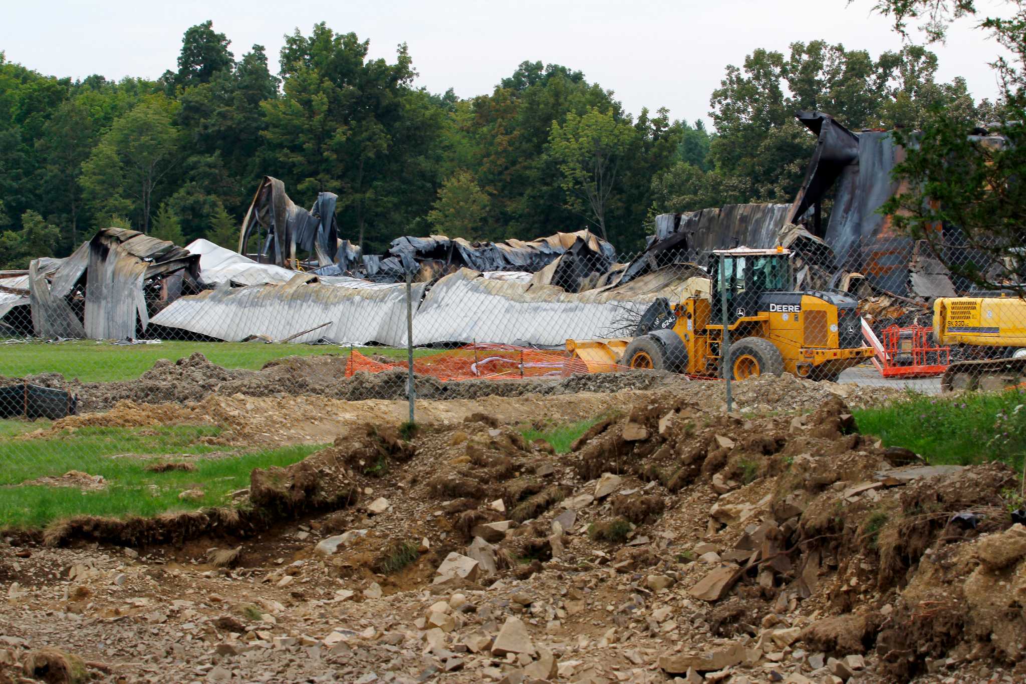 Fire cleanup starts as residents seek health information