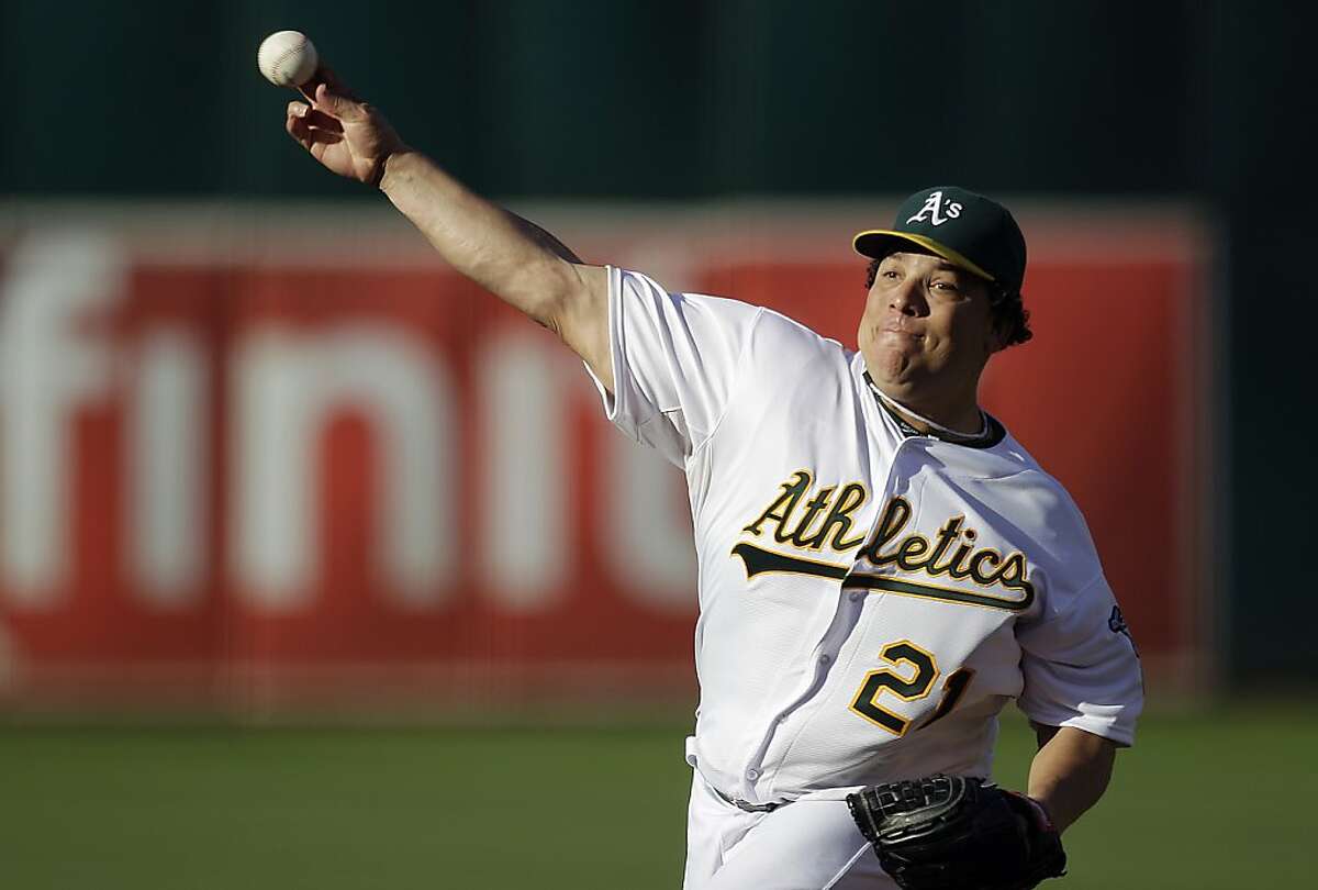 A's honor 2002 team with 8-5 win