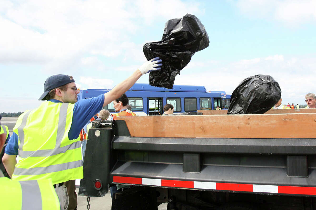 Airport volunteers clear dangerous debris