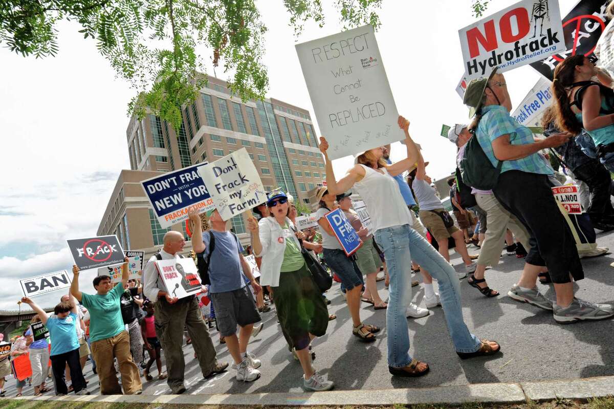 Hundreds march in opposition to fracking