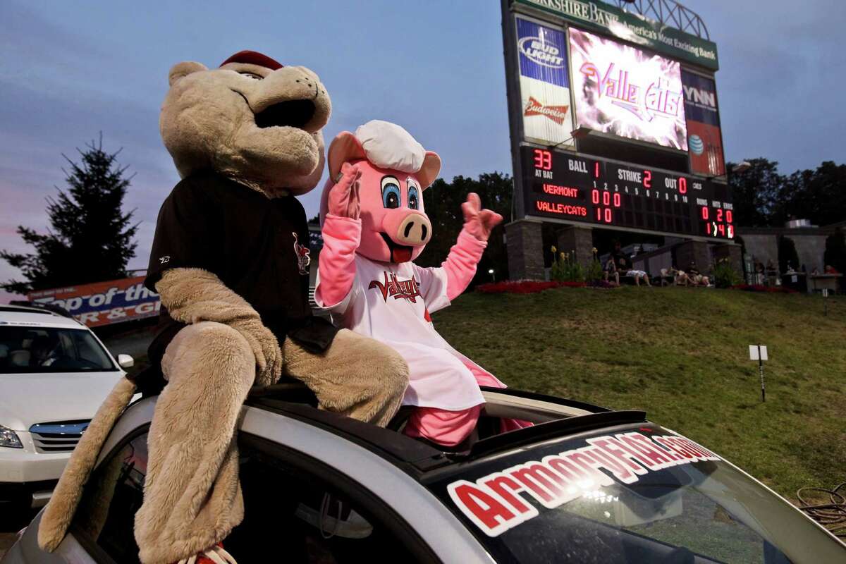 Mascot suits fit father, son
