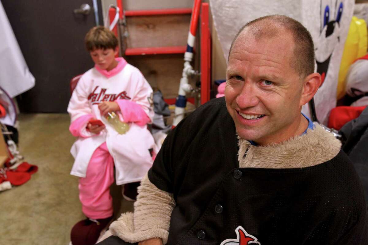 Mascot suits fit father, son