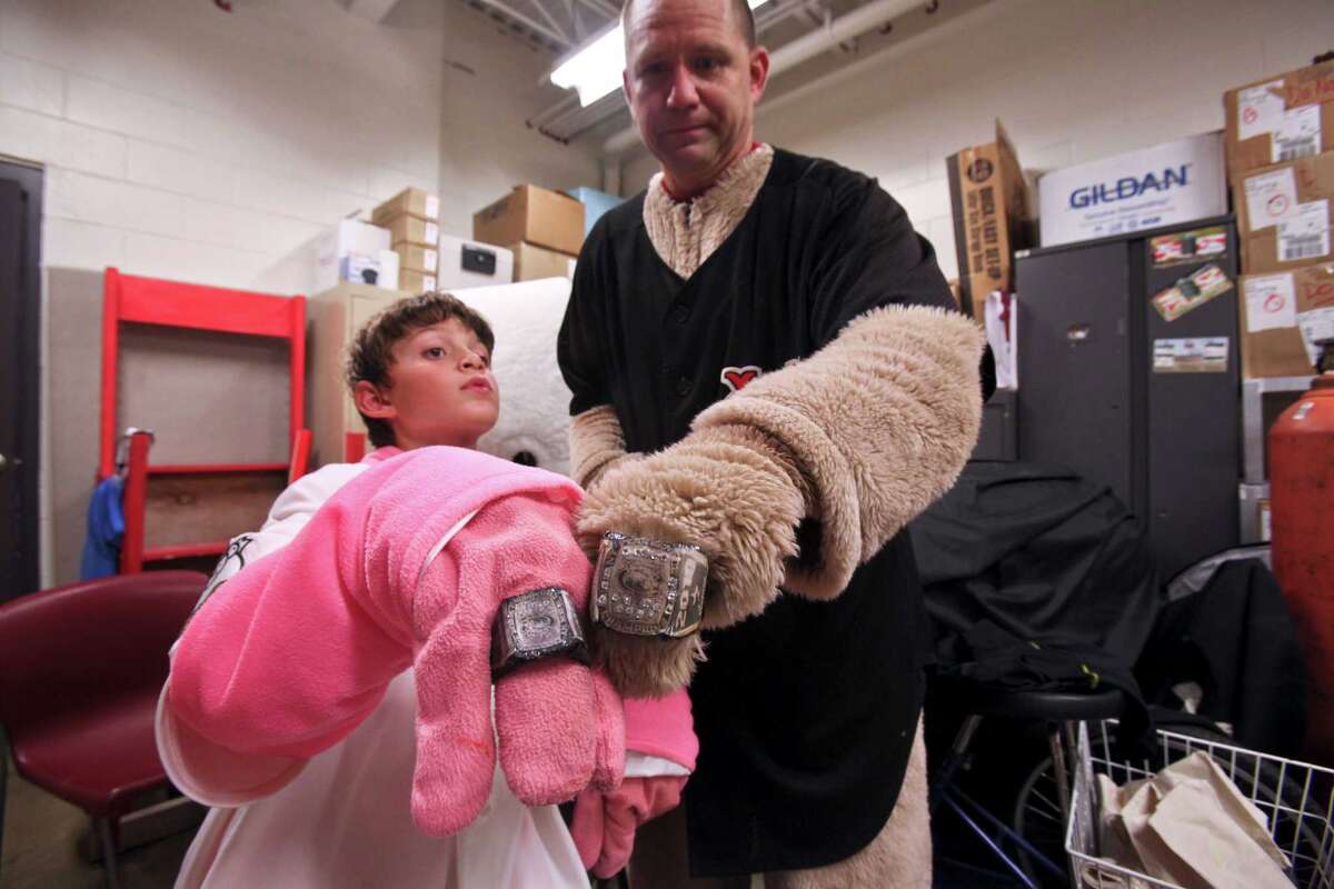 Mascot suits fit father, son