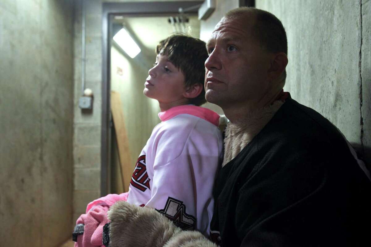 Mascot suits fit father, son