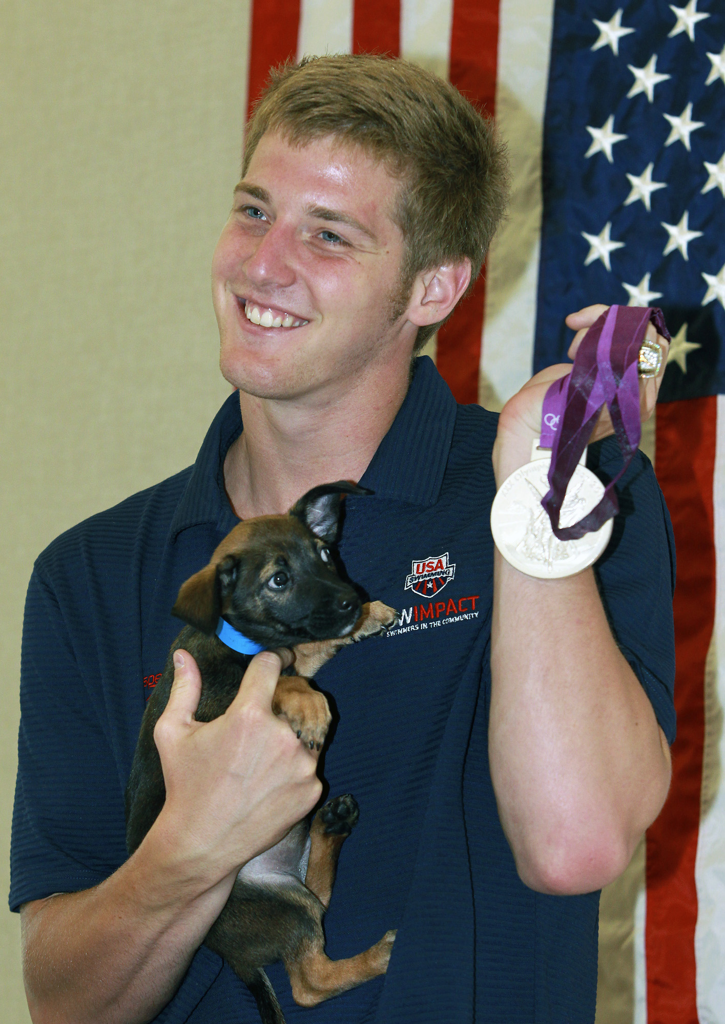 Silver medalist Feigen finds whirlwind life after London