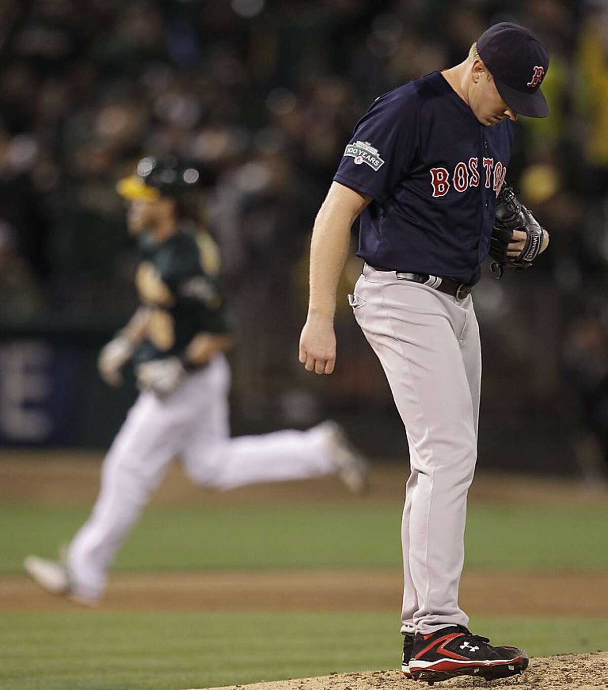A's pound on Red Sox, pennant race door
