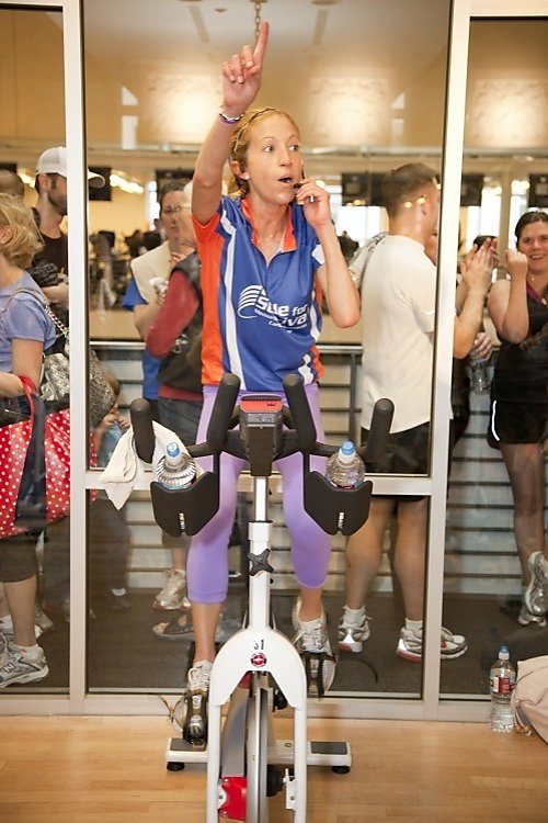 Studio cycling teacher keeps it upbeat