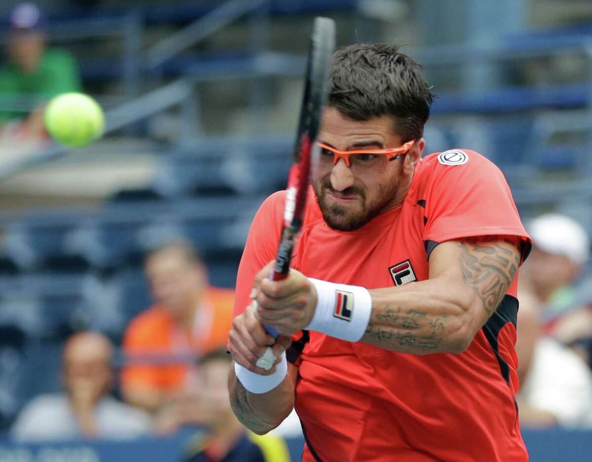 Roddick's career ends with Open defeat