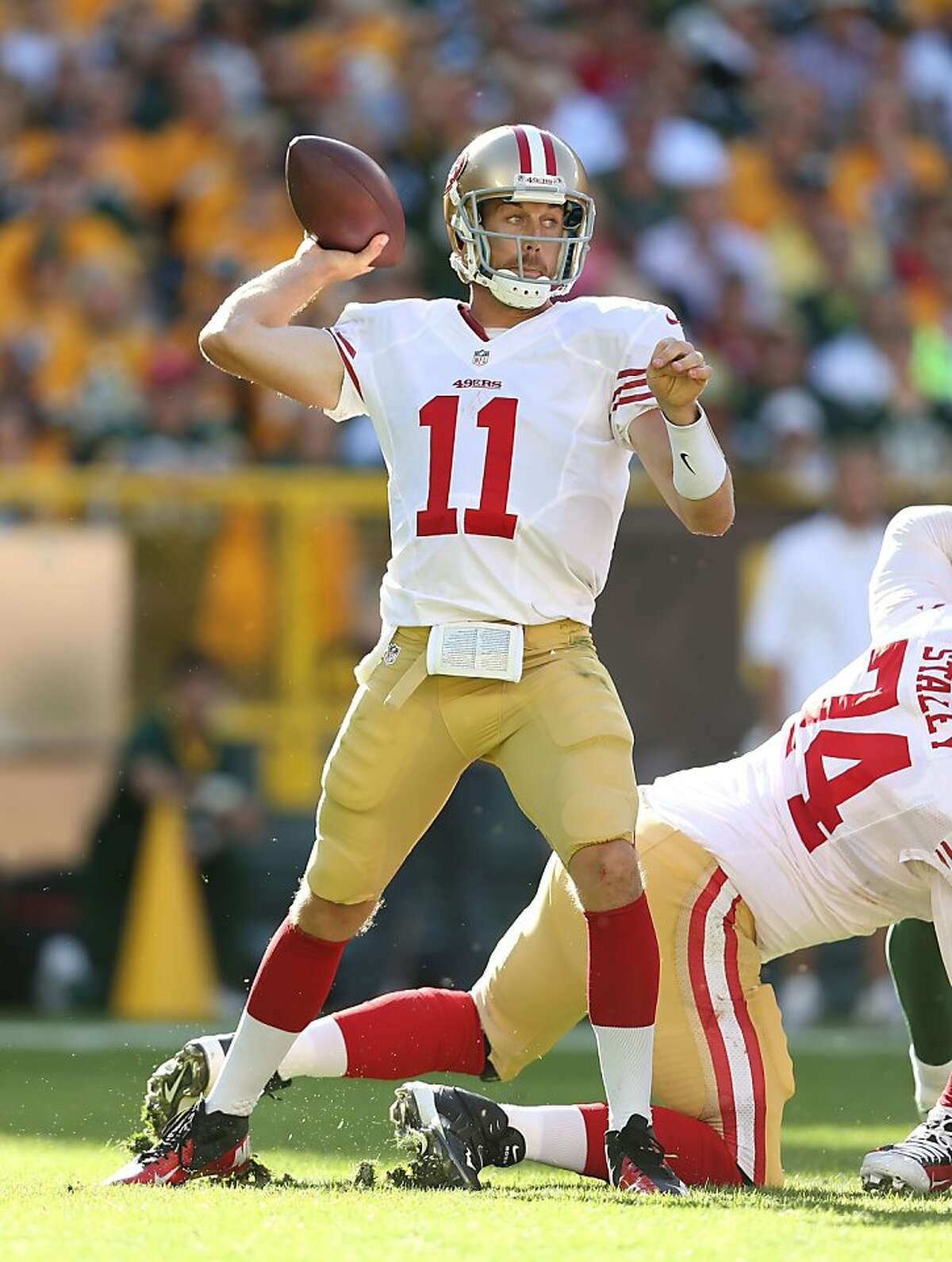 49ers' defense stuffs Green Bay, 30-22