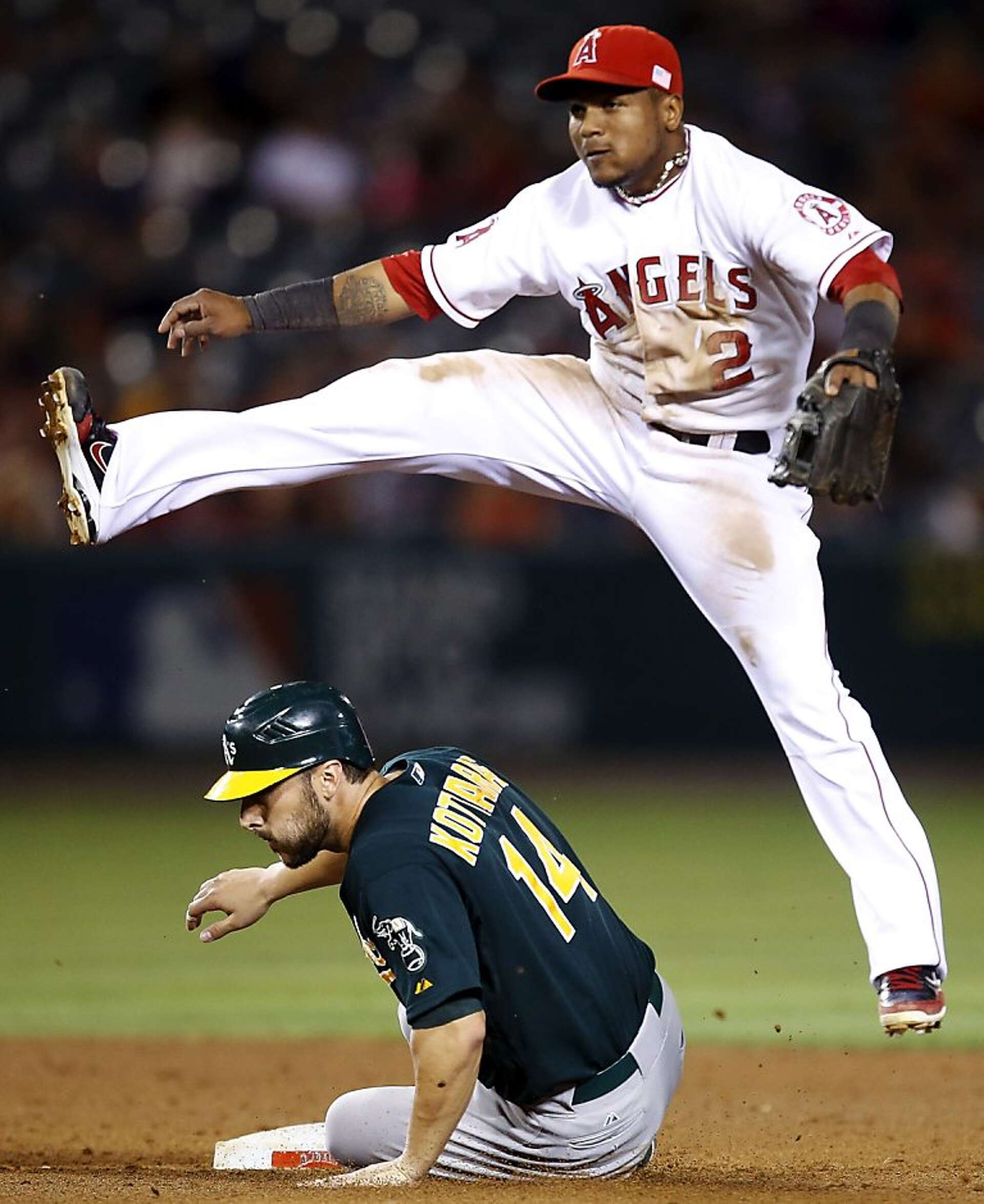 A's, bullpen hang on to beat Angels 6-5