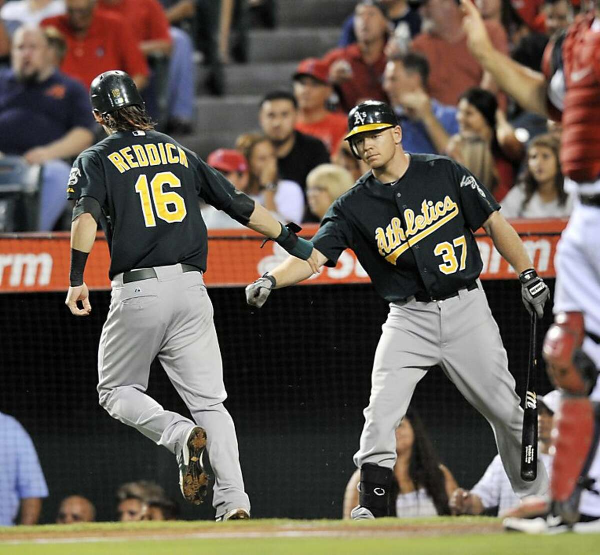 A's beat Angels - 12 road wins in a row