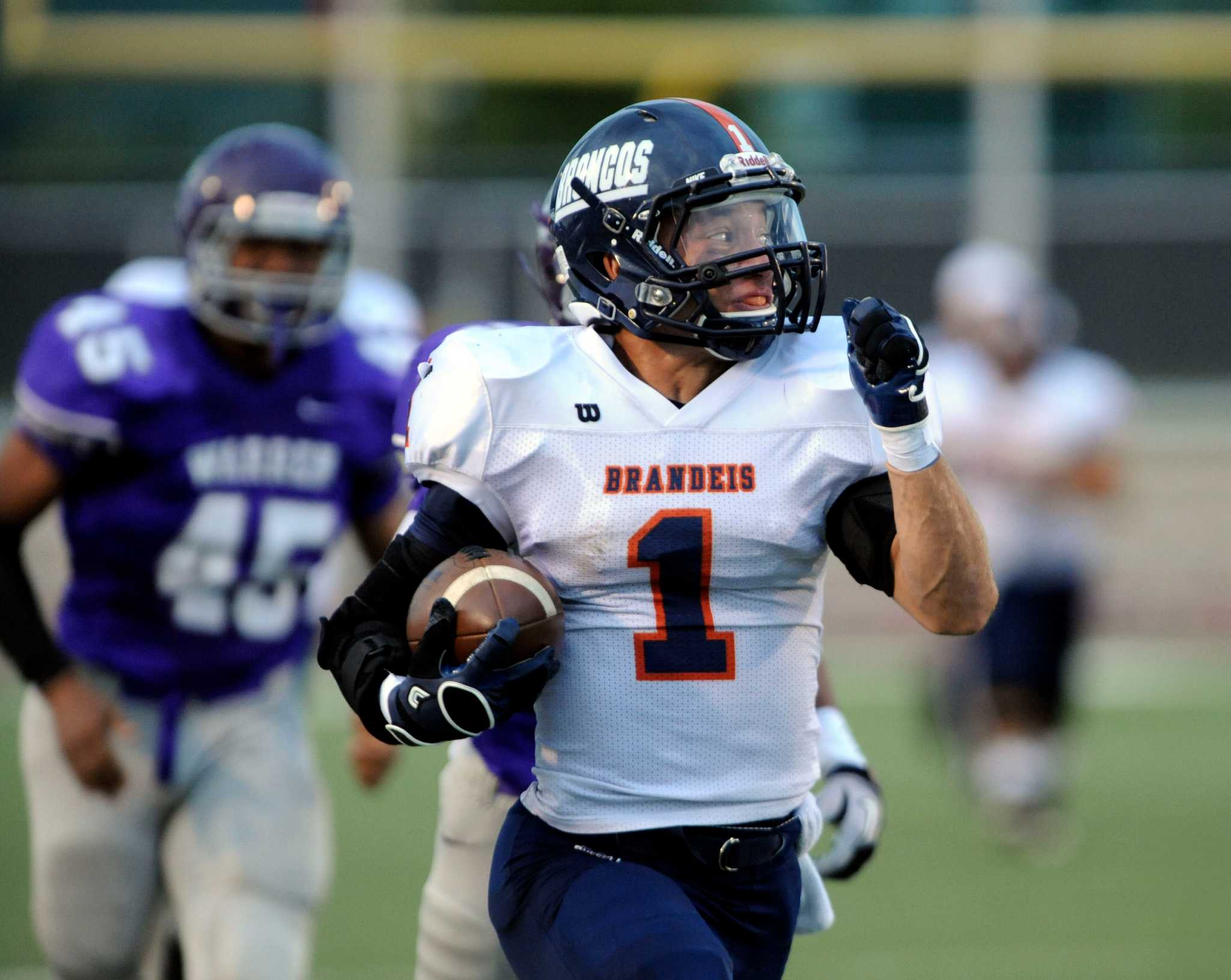 Brandeis' Ynclan rises above fray in debut