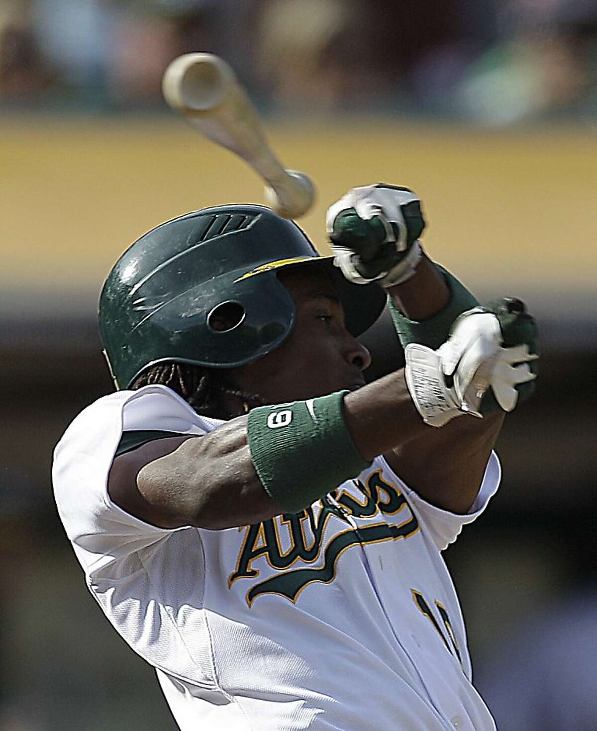 Orioles beat A's 9-5, cut wild-card lead