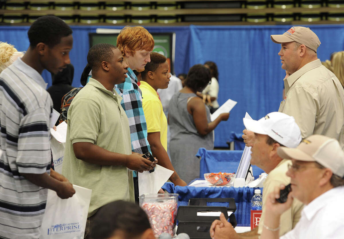 Job seekers flood career fair