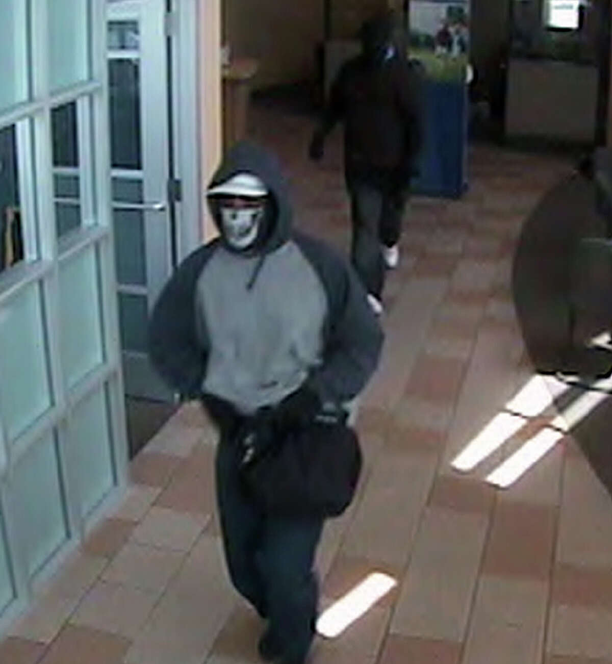 FBI investigating two armed bank robberies that happened within minutes