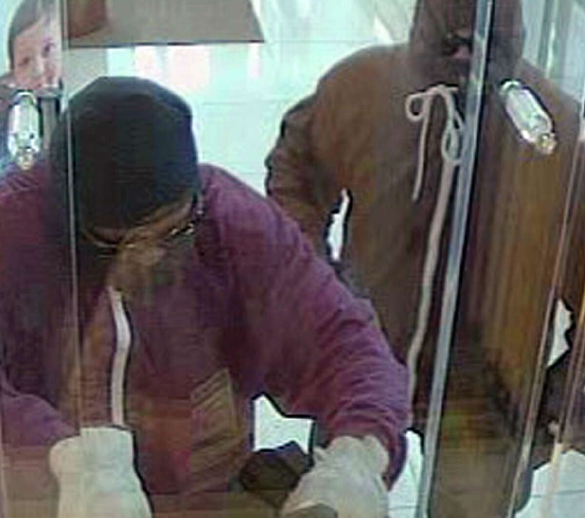 FBI investigating two armed bank robberies that happened within minutes