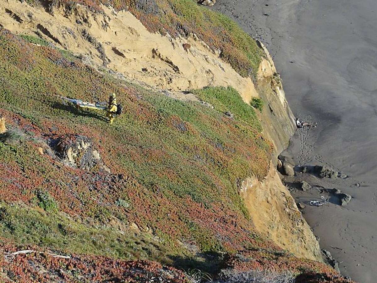 Cyclist rescued after falling off cliff
