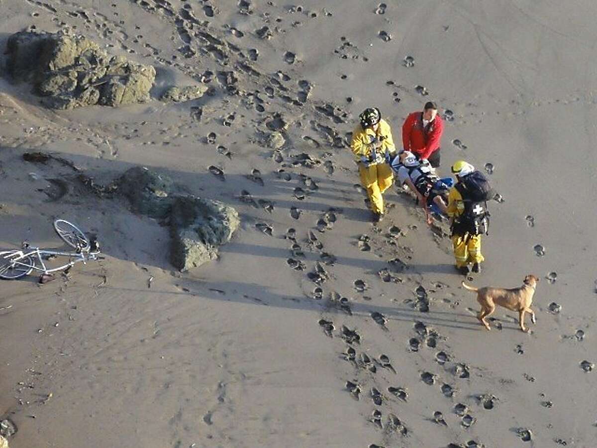Cyclist rescued after falling off cliff