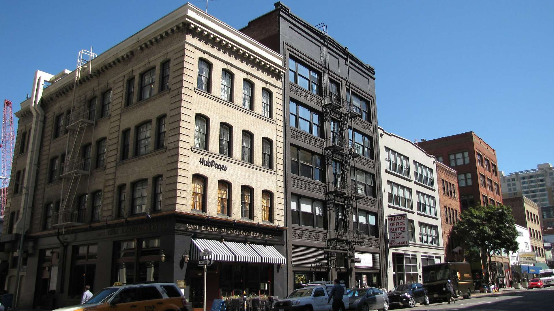 1907 building looks sharp wearing black