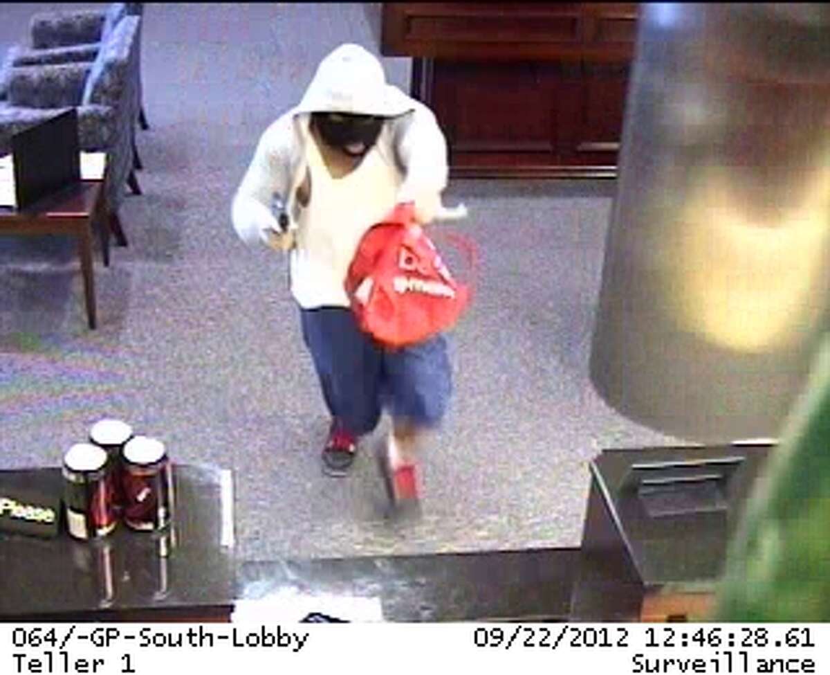 Gunman uses bright red tote bag in bank robbery
