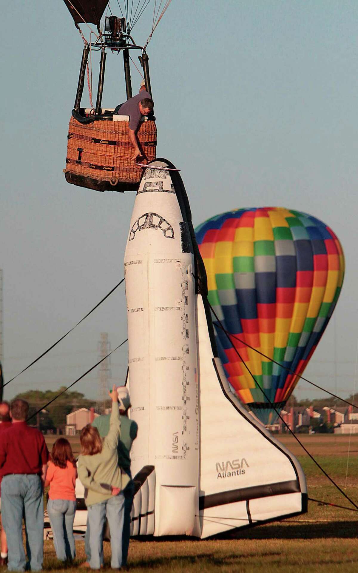 Hot air balloons take flight over Clear Lake