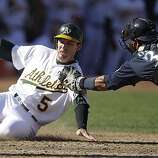 Moss' walk-off wins it for A's in 10th - SFGate