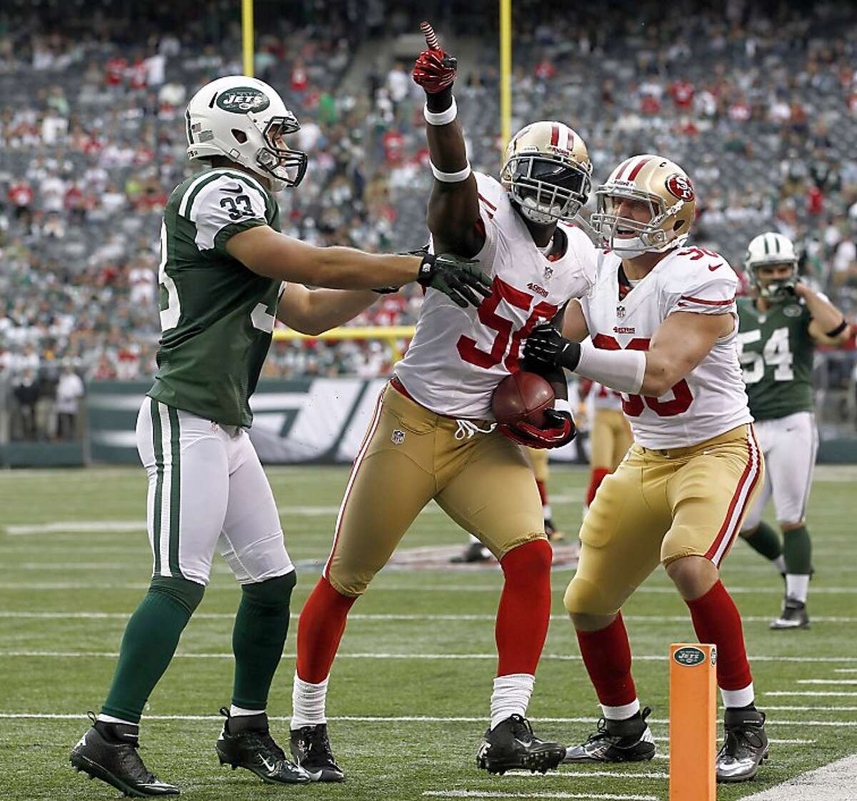 Defense leads 49ers to rout of Jets