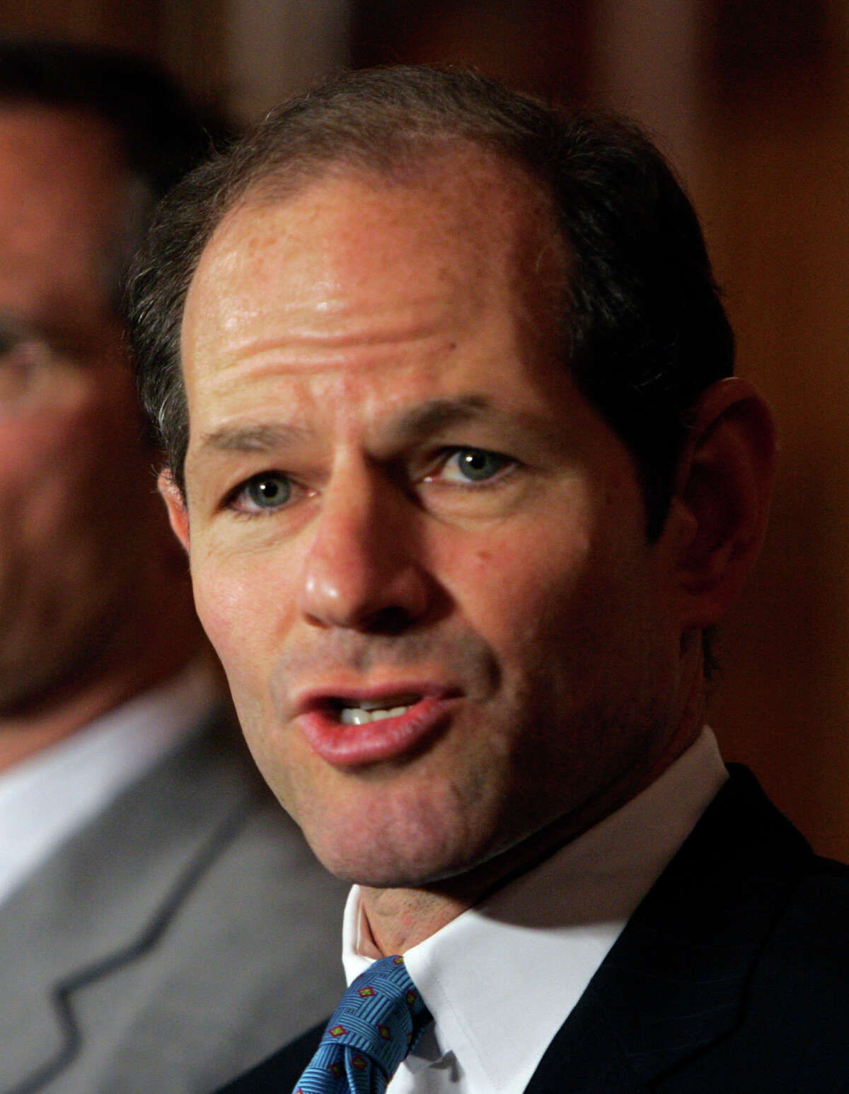 Spitzer returns for Albany talk