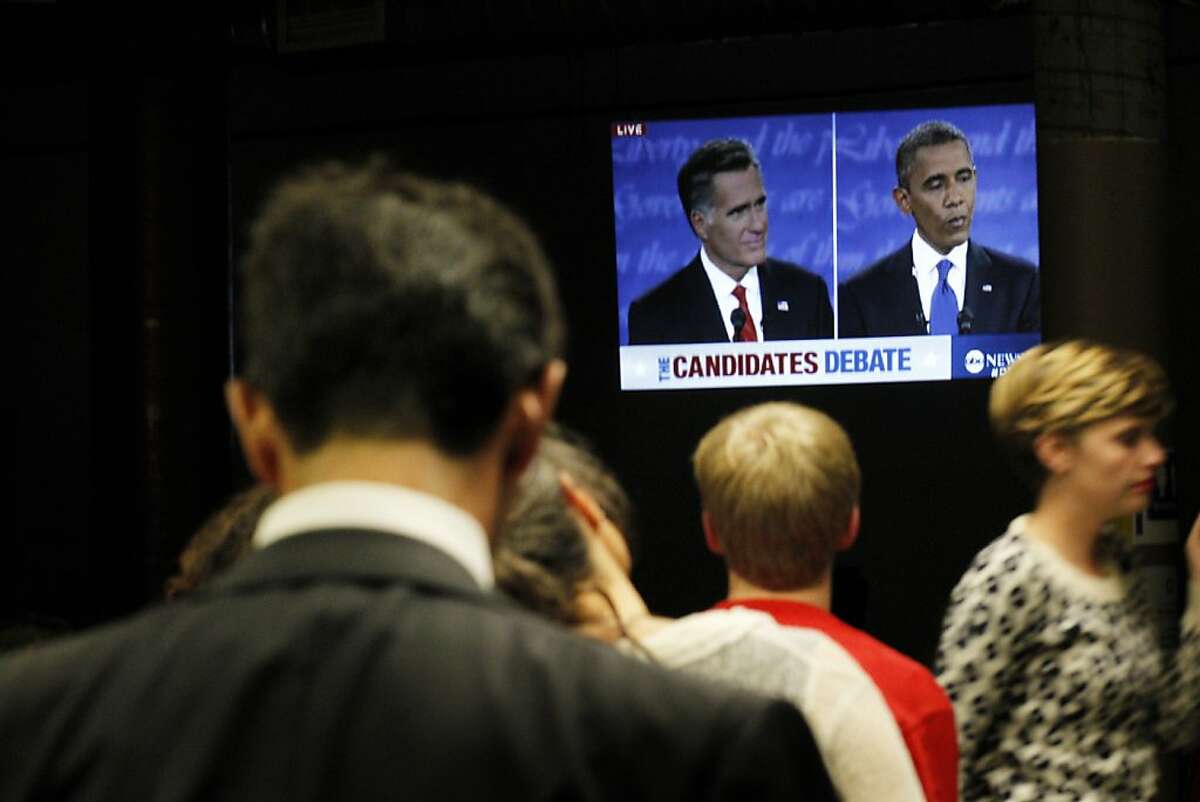 Romney, Obama square off in polite debate