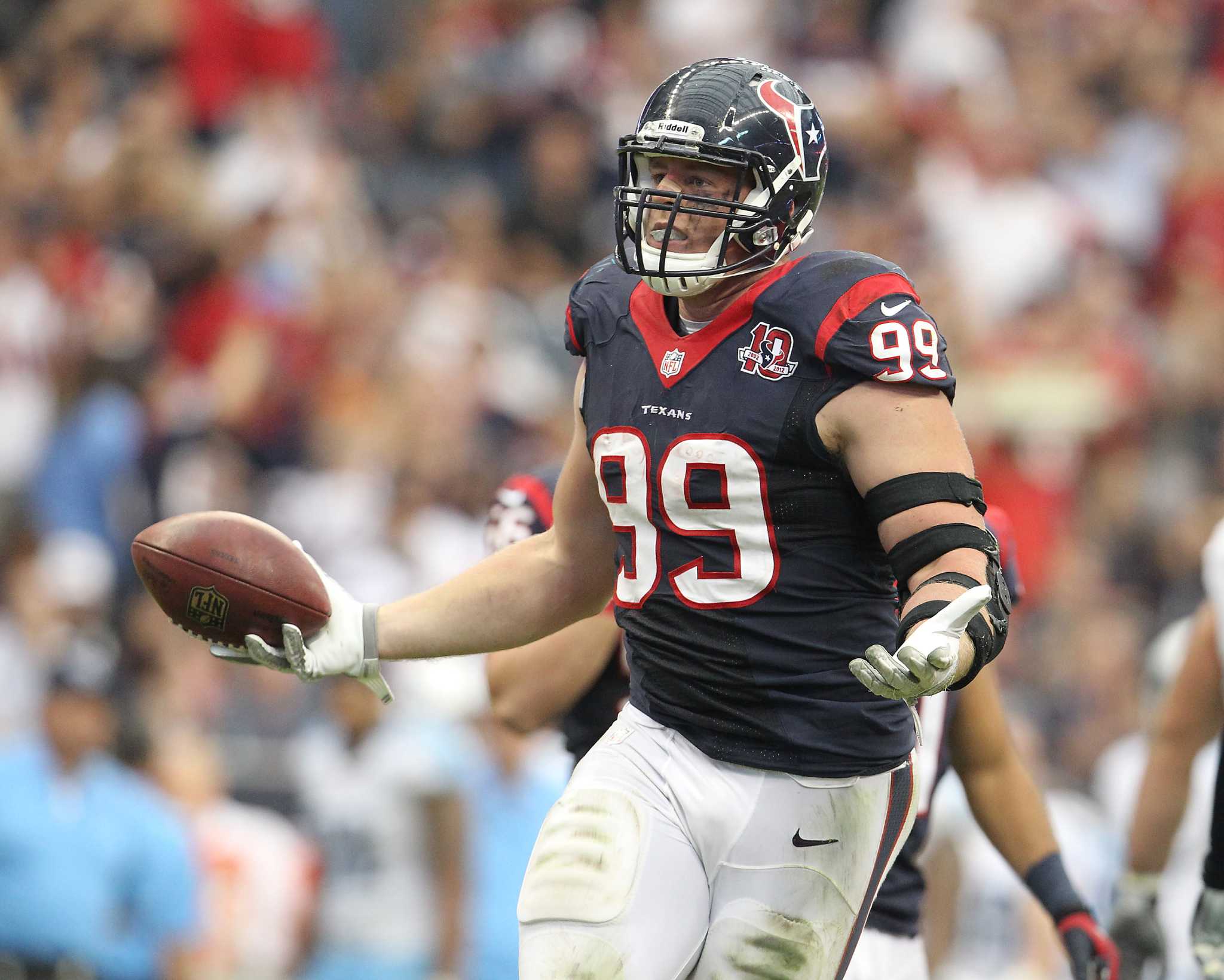 Texans' relentless Watt on a record pace