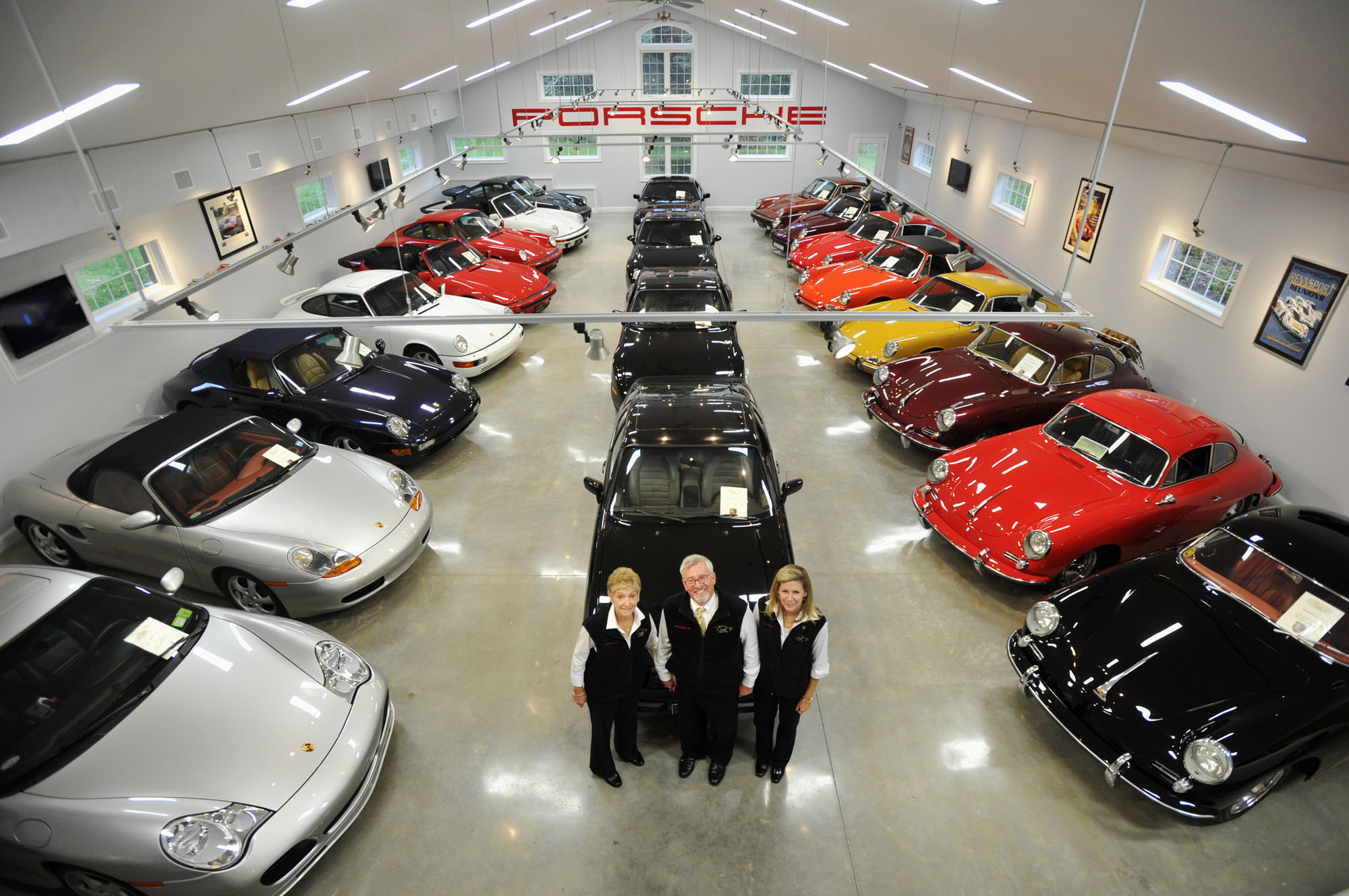 This couple likes to collect Porsches