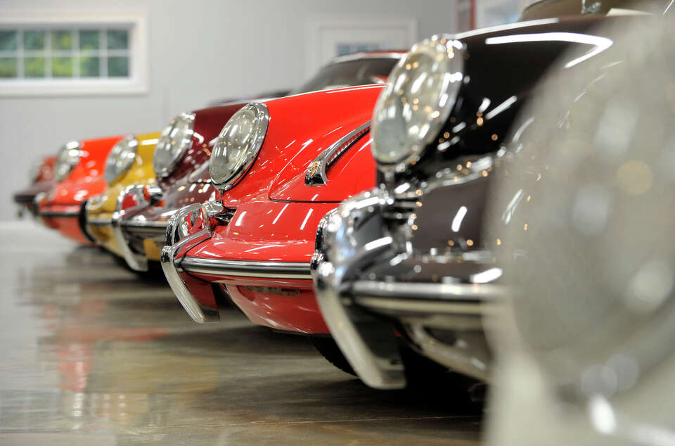 This couple likes to collect Porsches