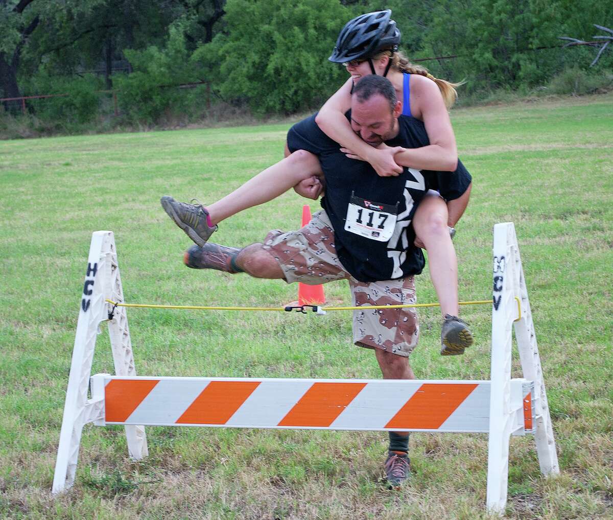 Partners carry partners to victory – literally – in Hill Country Village