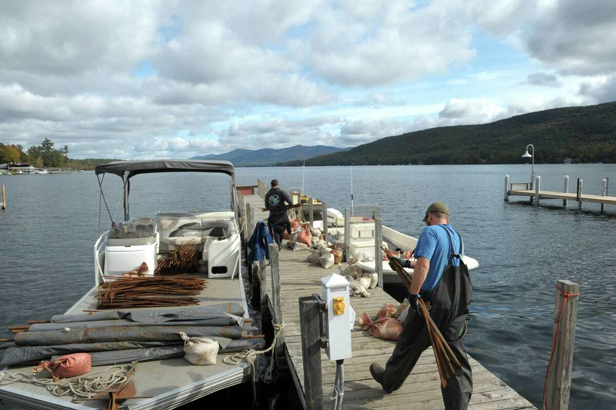 Photos: Battling lake invaders