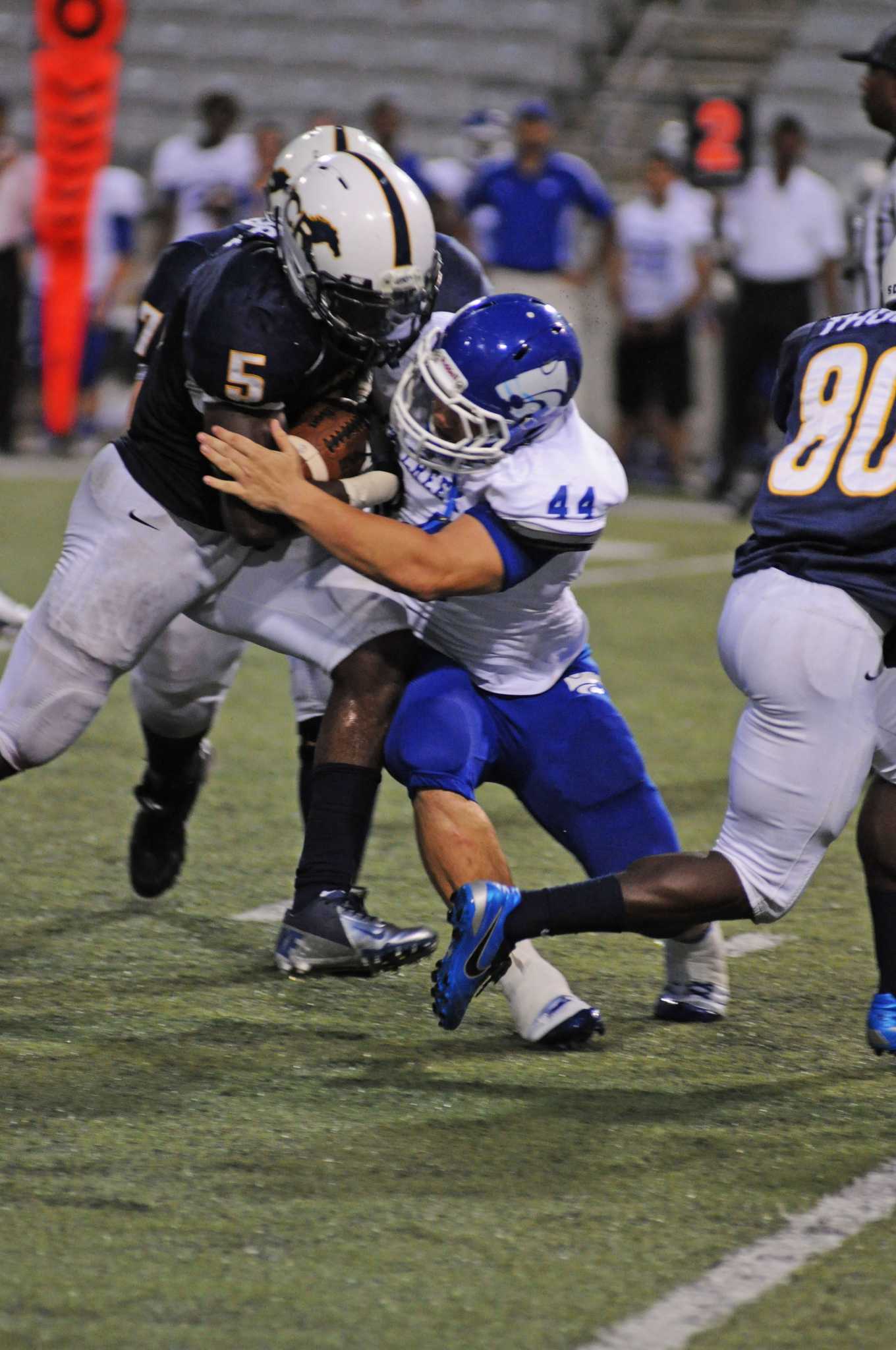 Football: Cy Ridge, Cy Falls fight for first