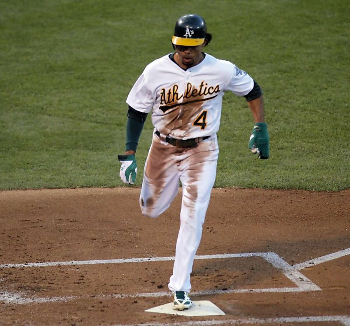 A's shut out Tigers 2-0 to stay alive