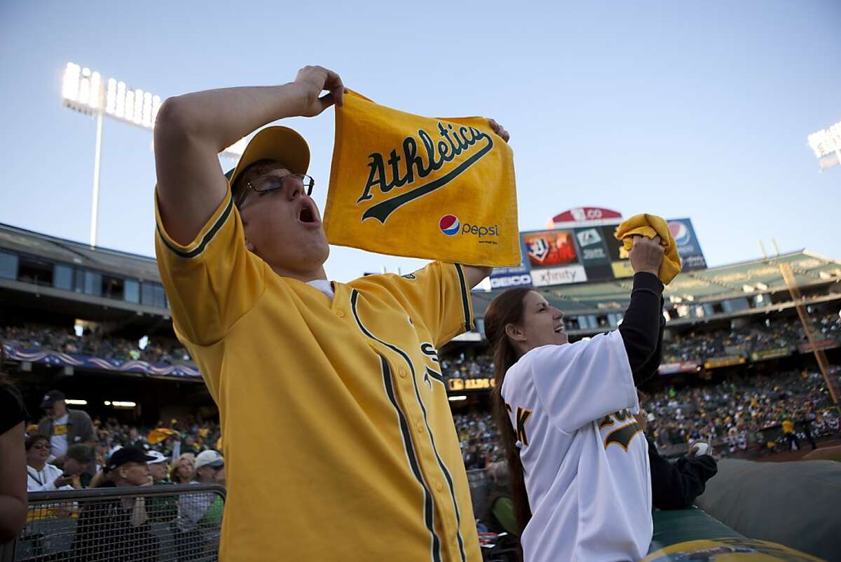 A's shut out Tigers 2-0 to stay alive