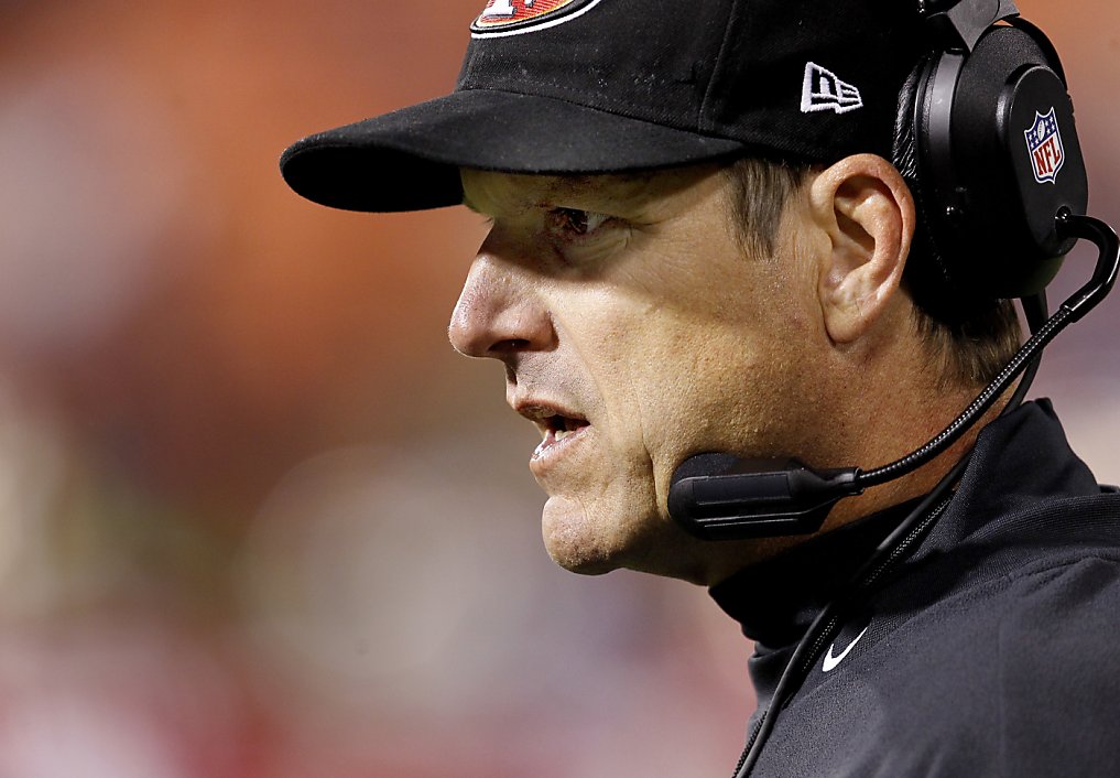 Harbaugh strongly defends Justin Smith