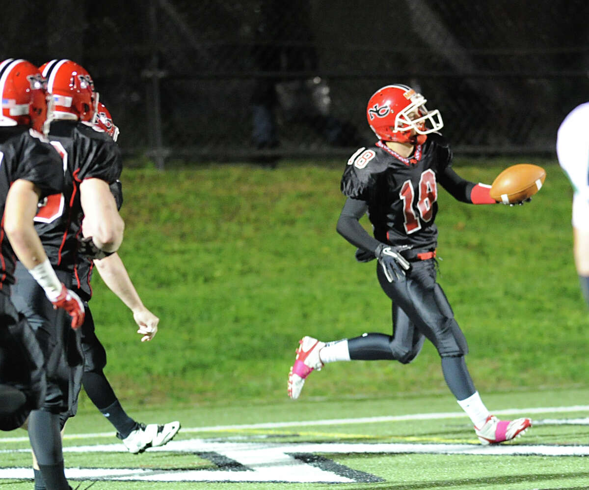 New Canaan football rolls over Norwalk