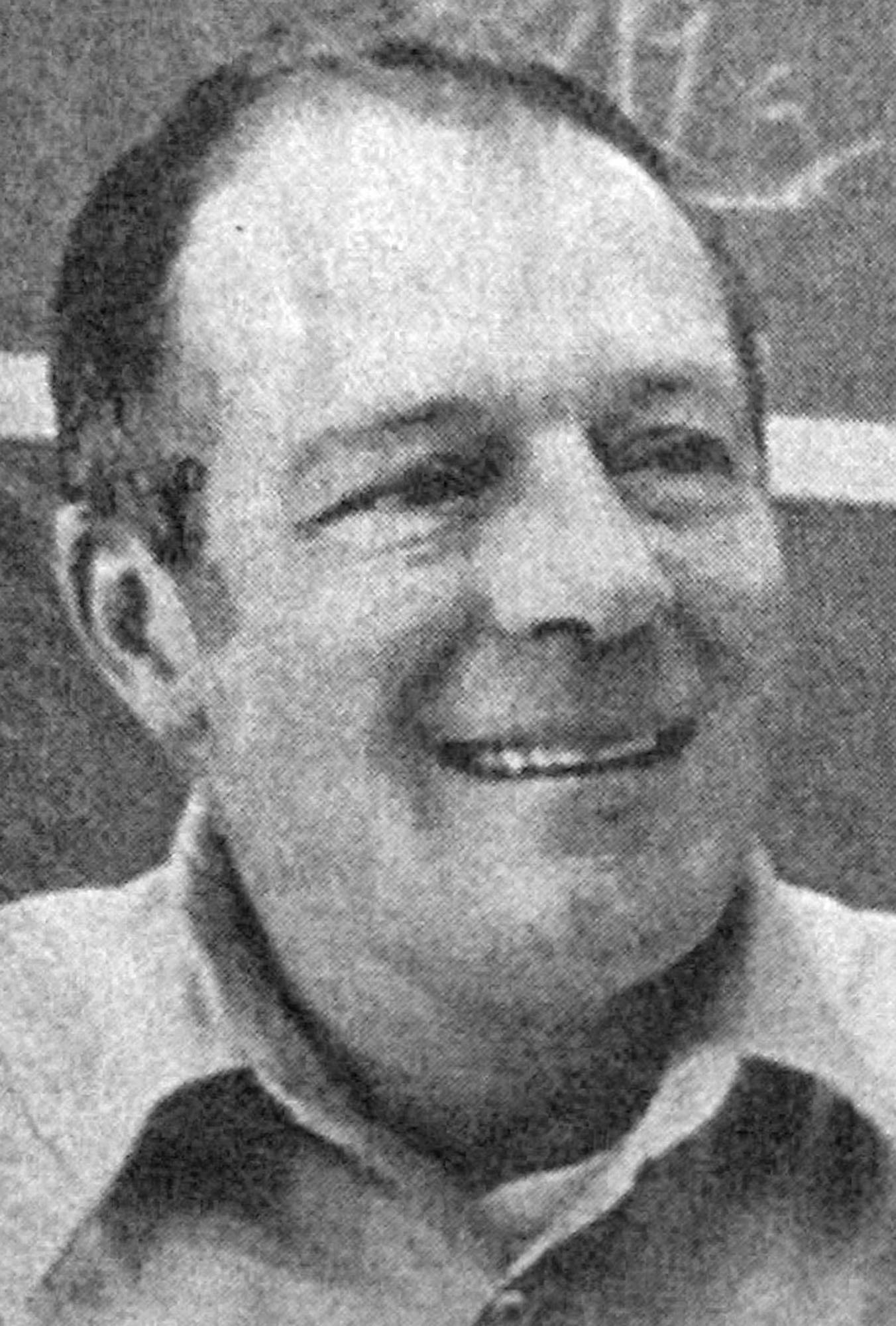 Russell L. Devin, 83, was an educator, coach