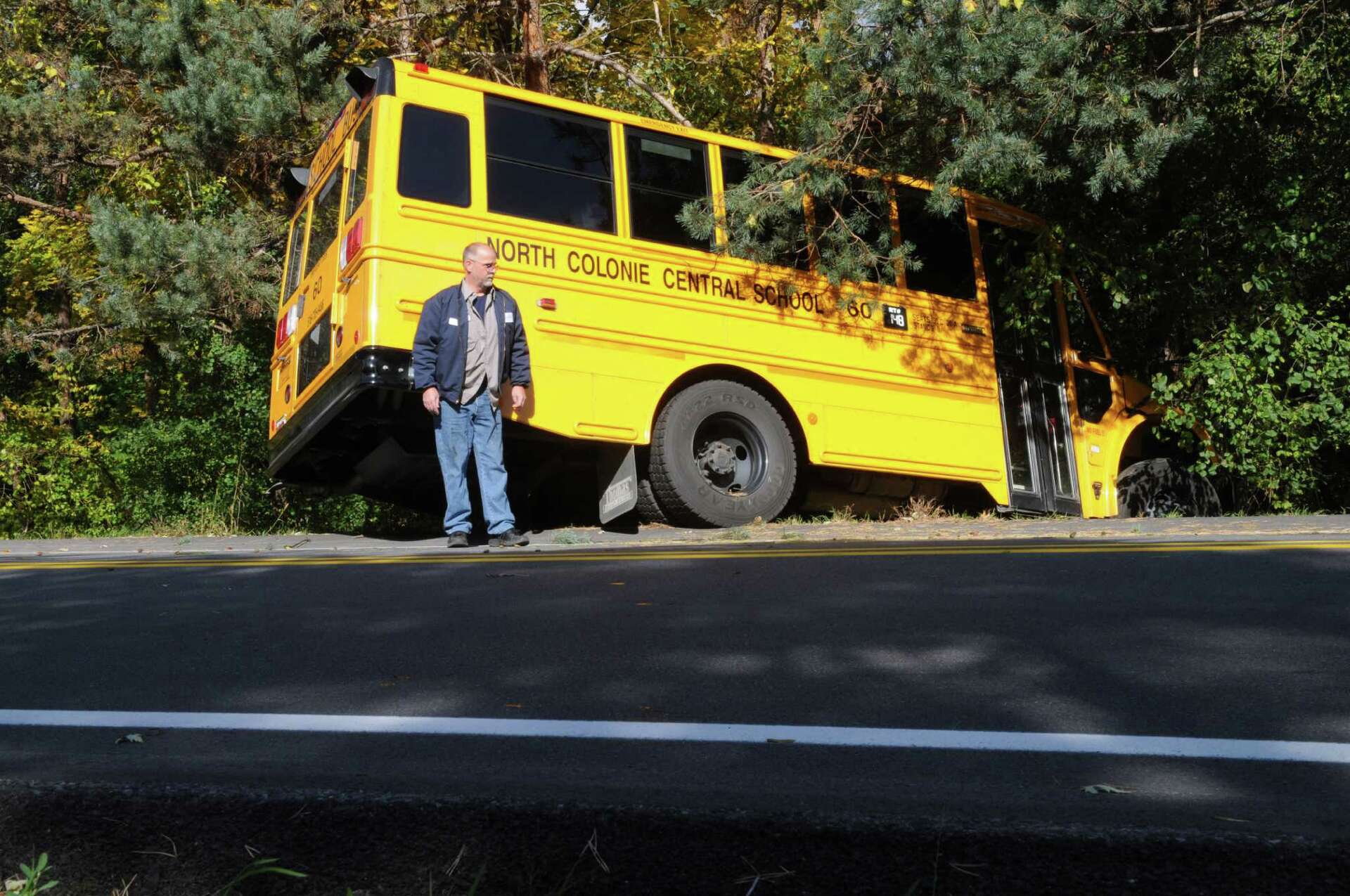School bus slides into ditch