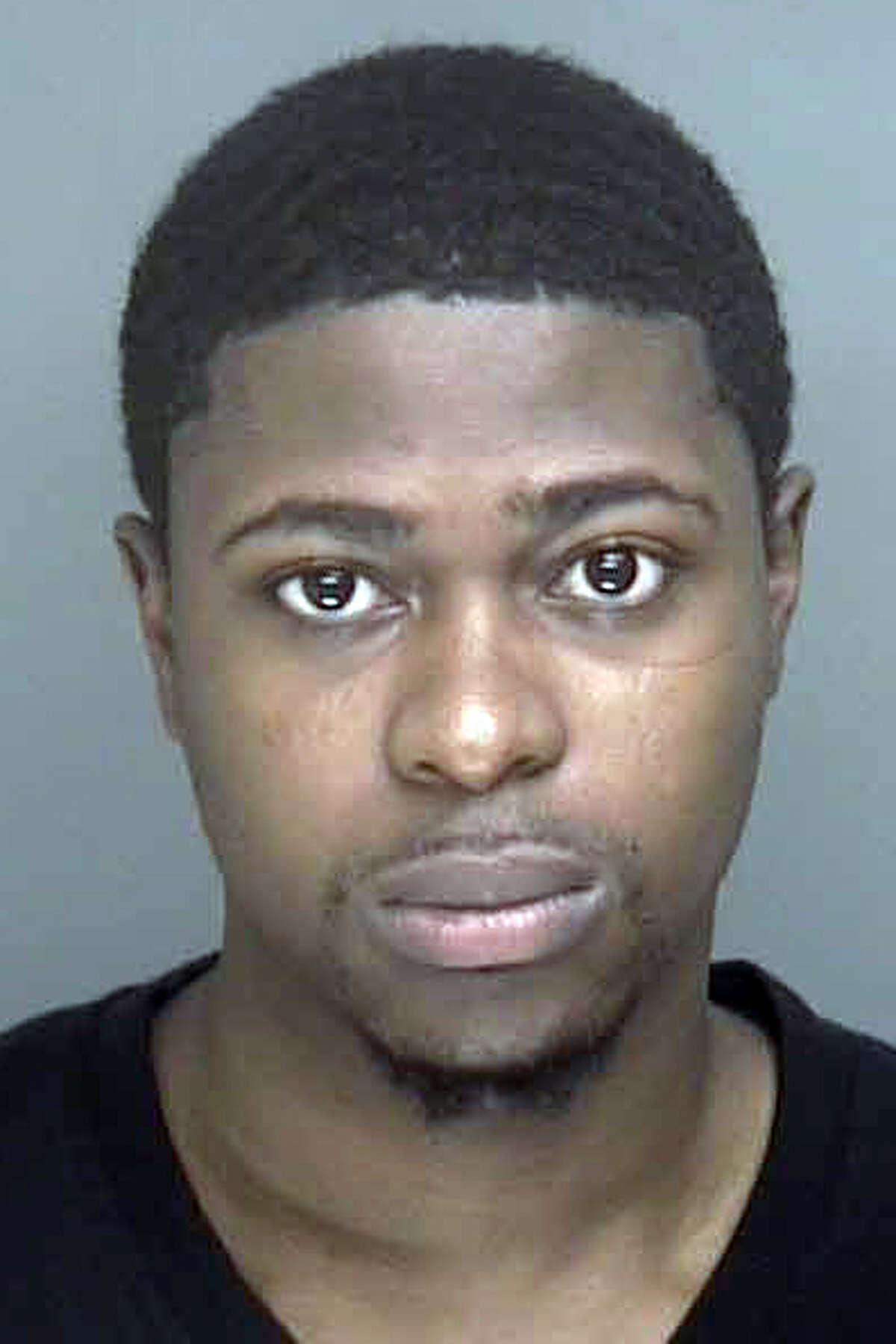 Melee erupts during murder arraignment