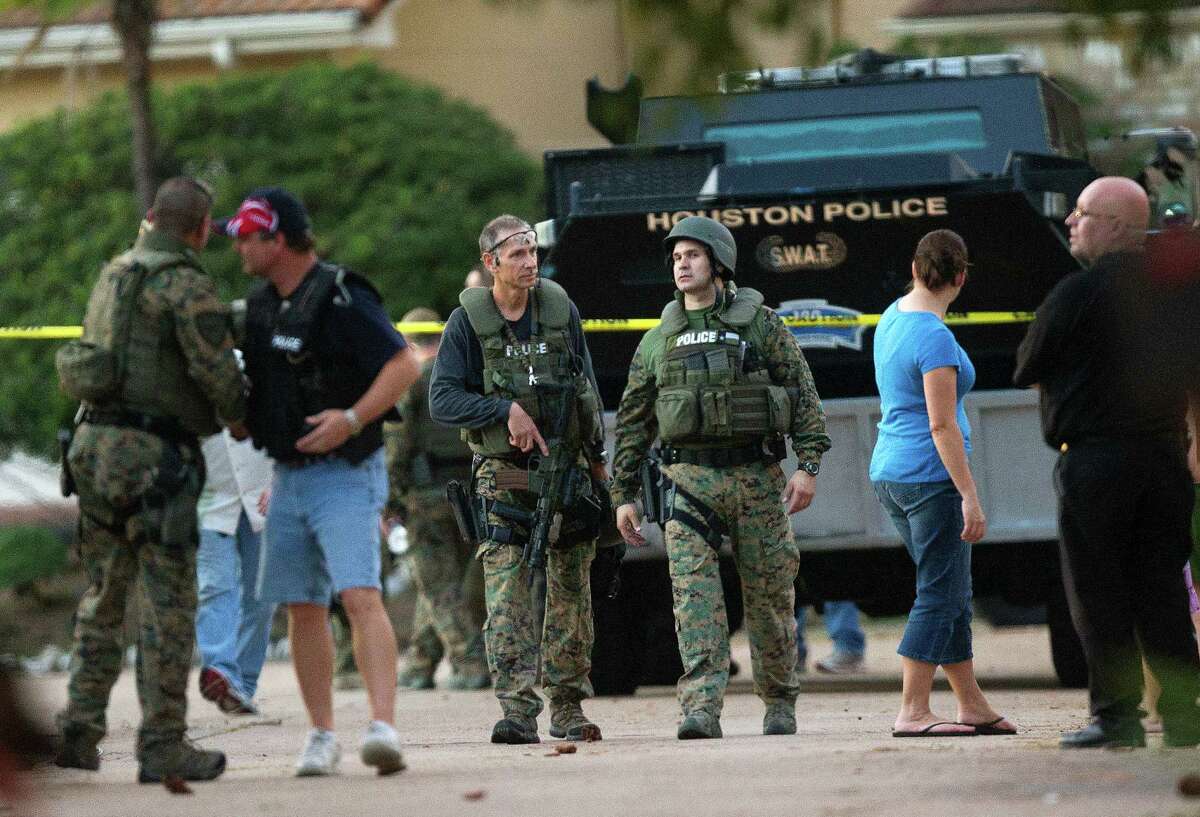 Man slain by HPD officer after SW Houston standoff