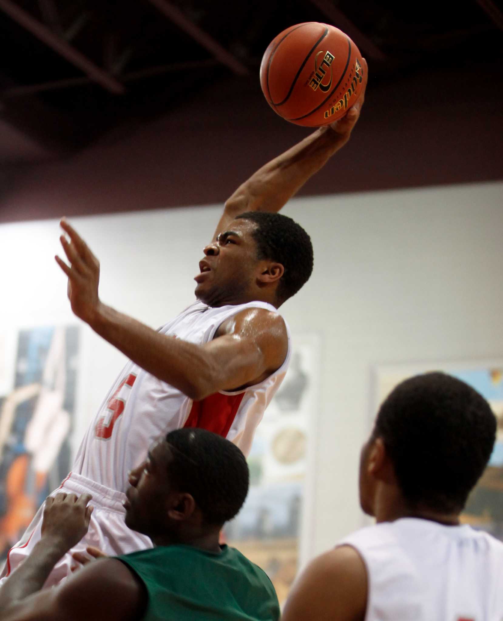 Basketball: Travis eager to live up to hopes