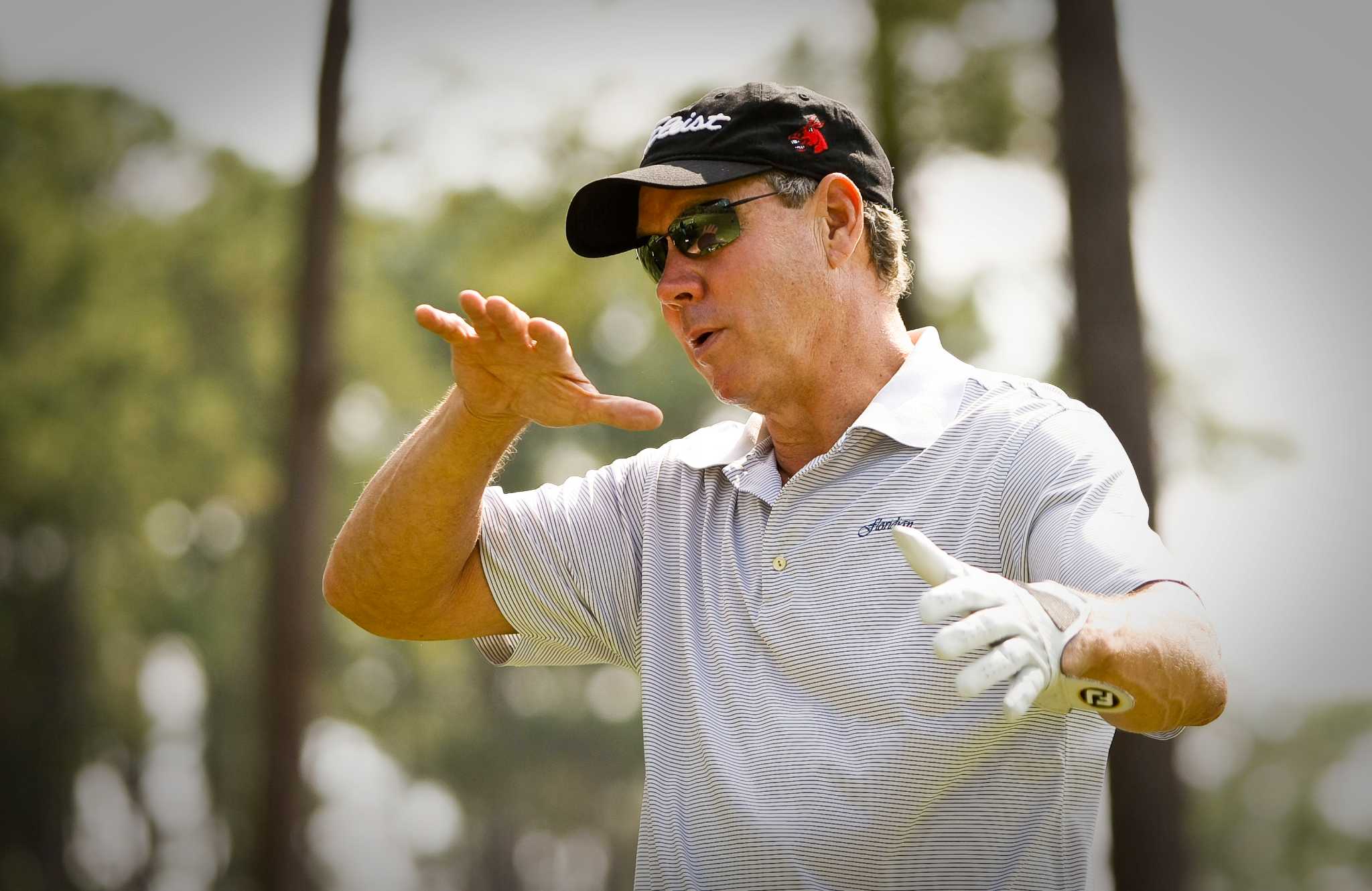 Astros owner excels on the golf course