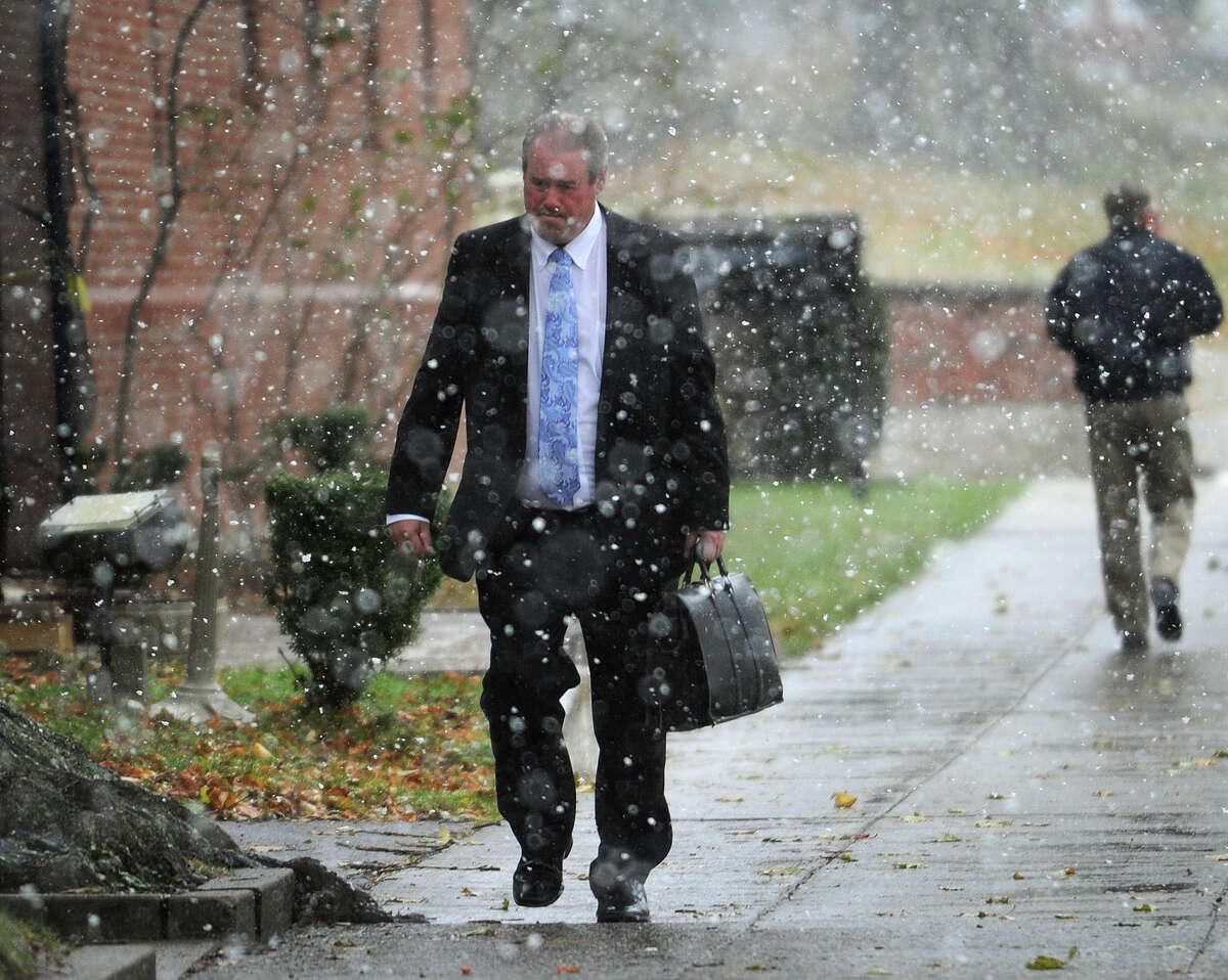 Snow continues to fall, roads remain treacherous
